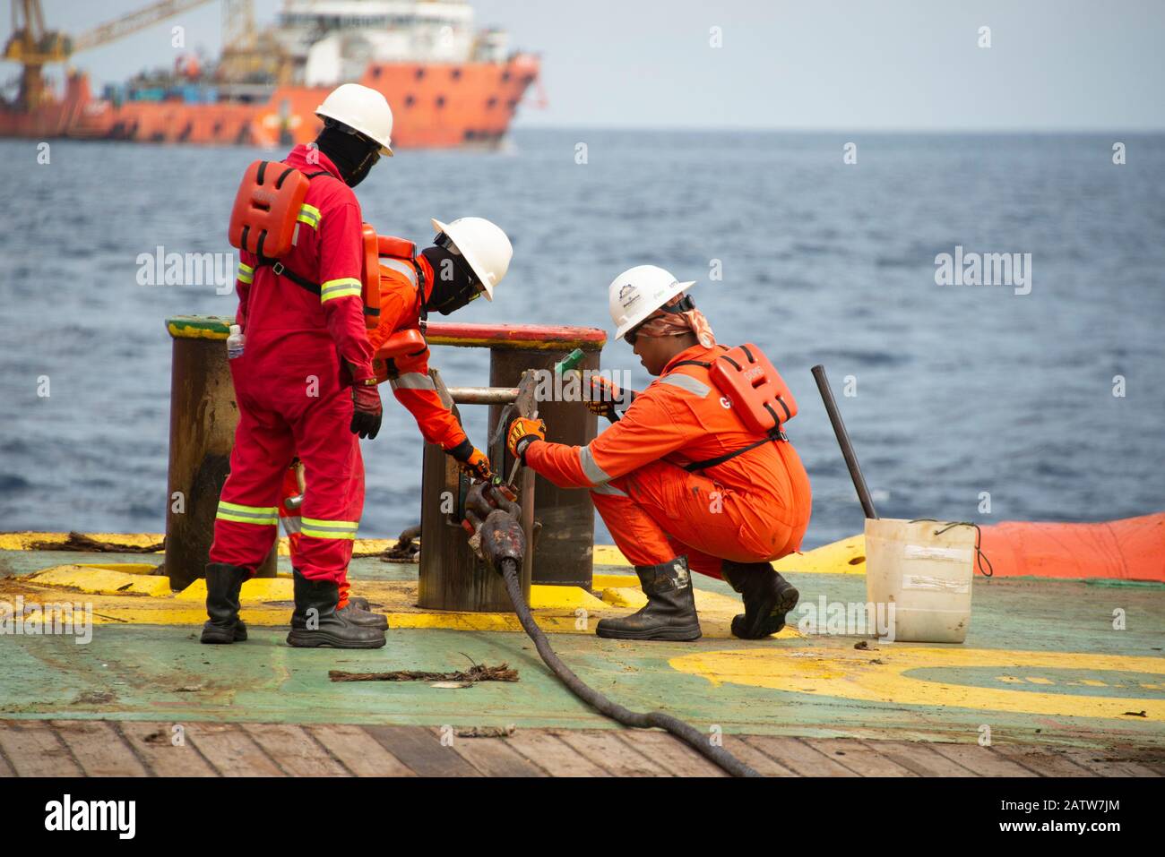 AHTS vessel marine crew carried out anchor handling operation on deck ...