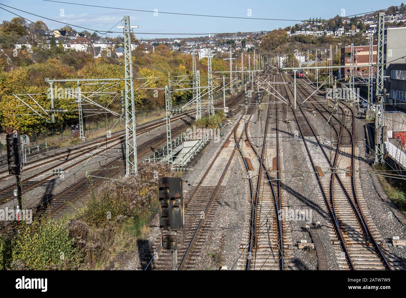 Railway station with rails and overhead lines Stock Photo - Alamy