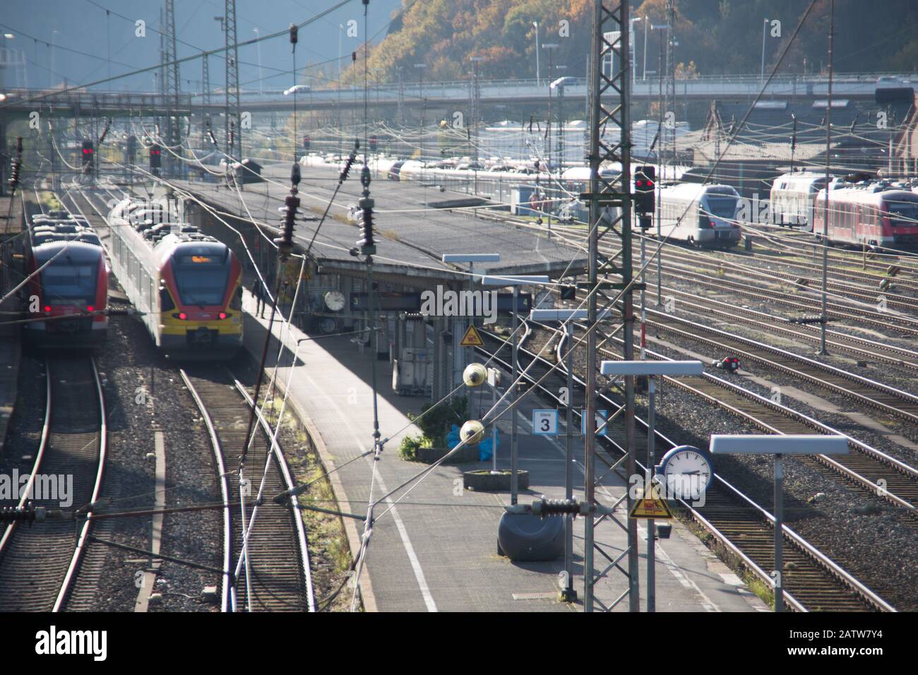 Railway station with rails and overhead lines Stock Photo - Alamy