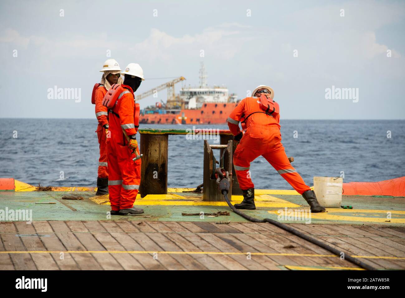 AHTS vessel marine crew carried out anchor handling operation on deck ...