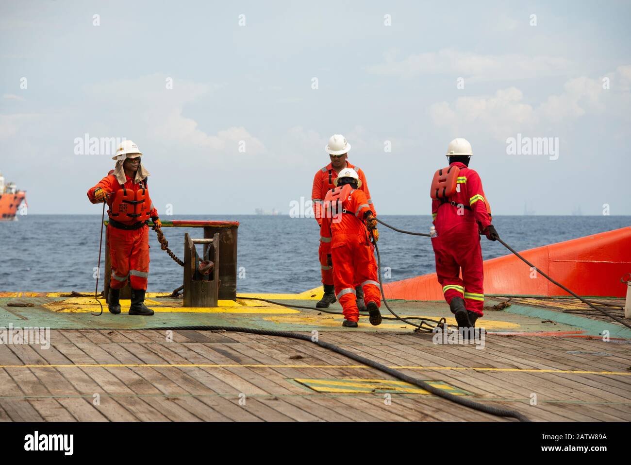 AHTS vessel marine crew carried out anchor handling operation on deck ...