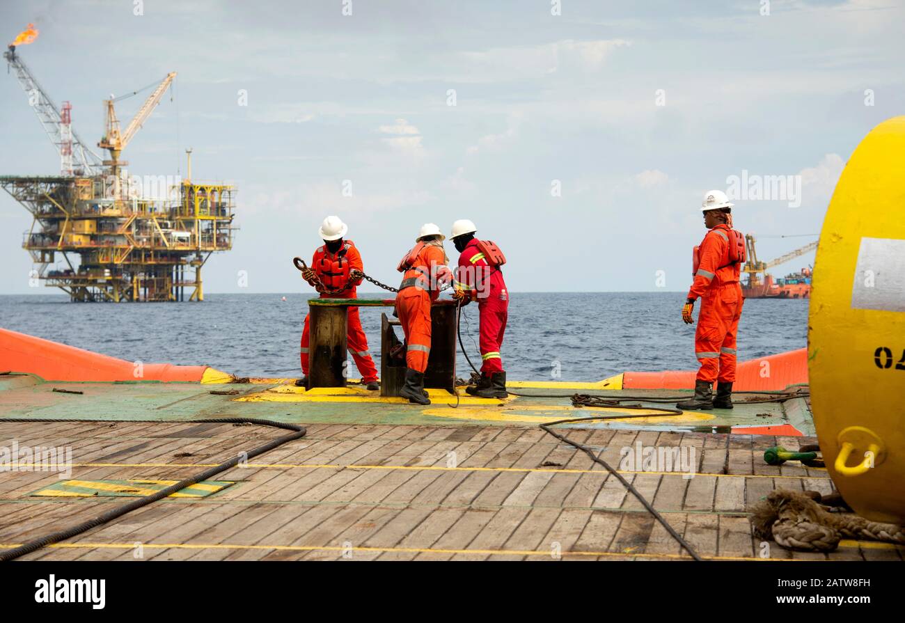 AHTS vessel marine crew carried out anchor handling operation on deck ...
