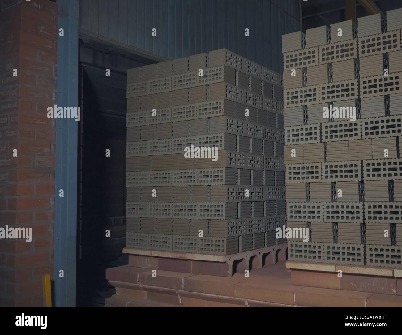 Transporting raw bricks to the roasting stove. Brickworks Stock Photo ...