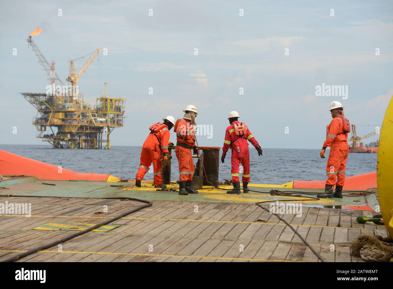 AHTS vessel marine crew carried out anchor handling operation on deck ...