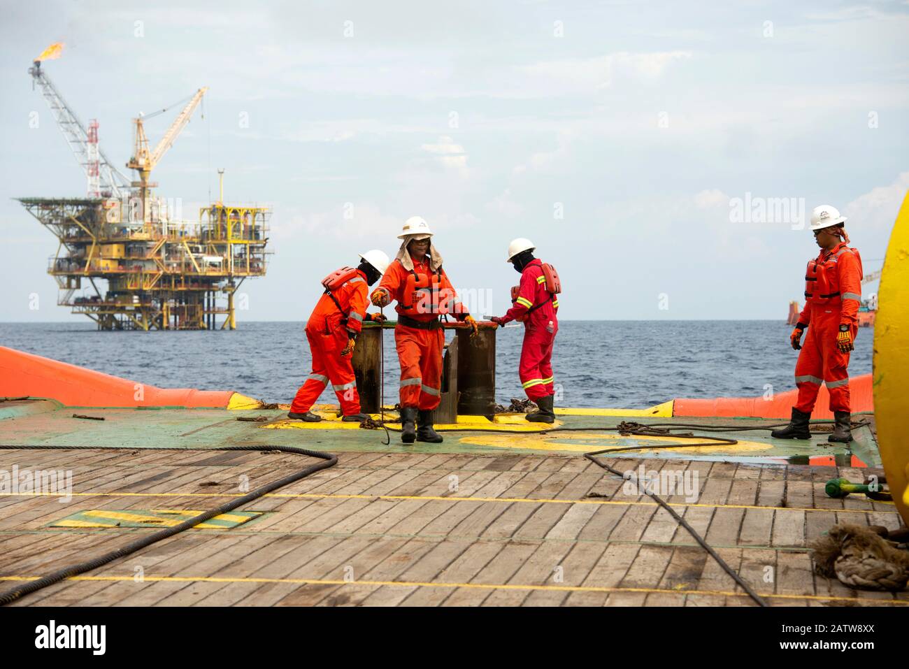 AHTS vessel marine crew carried out anchor handling operation on deck ...