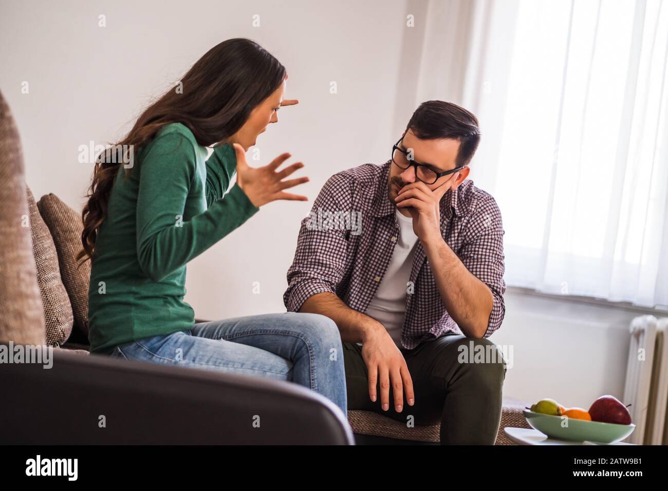 Man arguing with his wife hi-res stock photography and images - Alamy