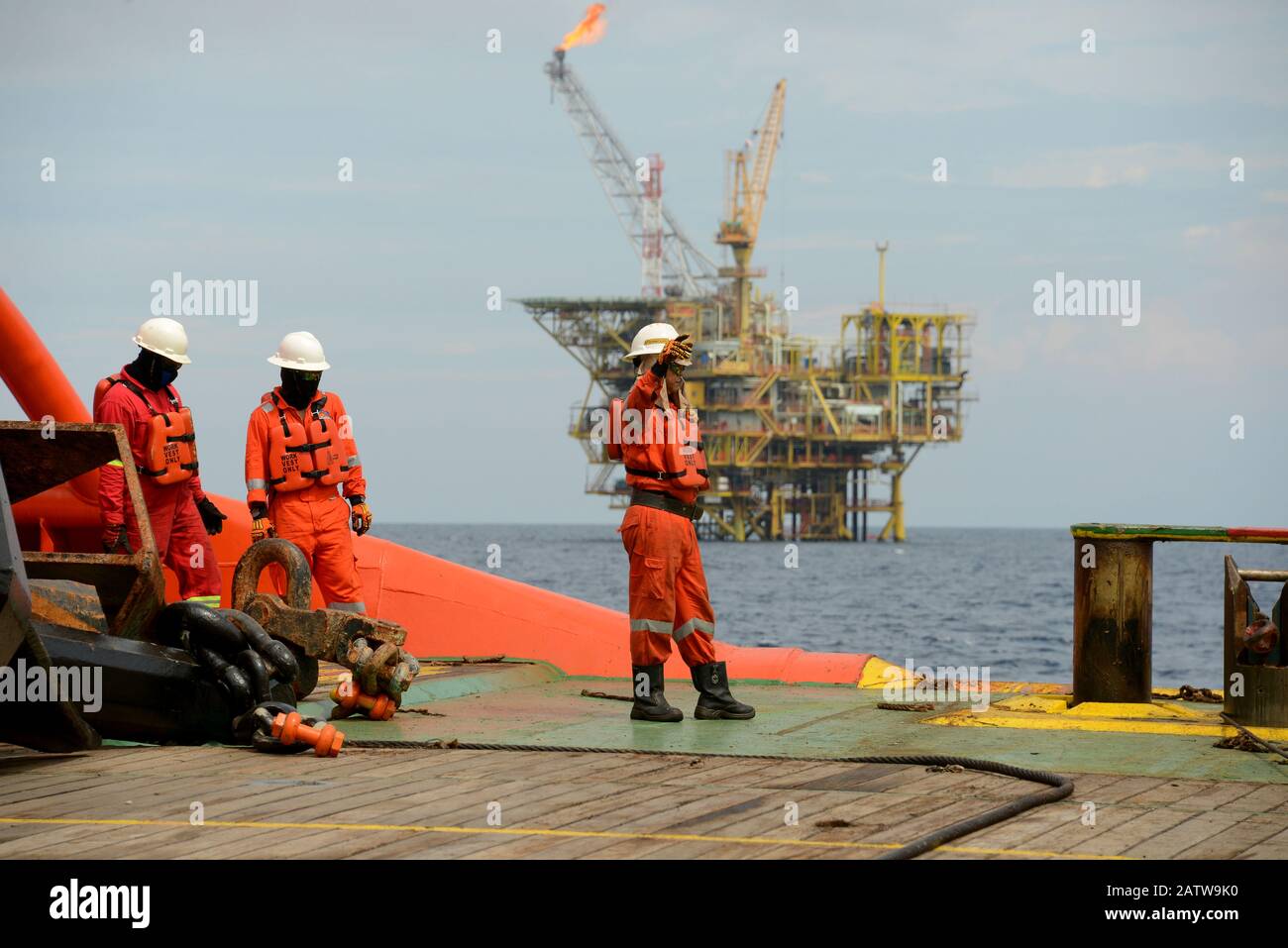 AHTS vessel marine crew carried out anchor handling operation on deck ...