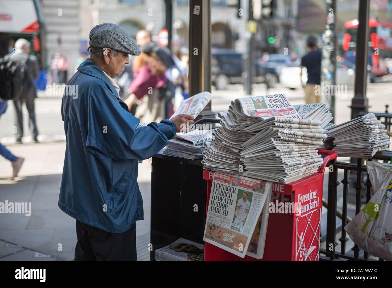 Street Photography: Elderly Newspaper Salesman with a hat in London's ...