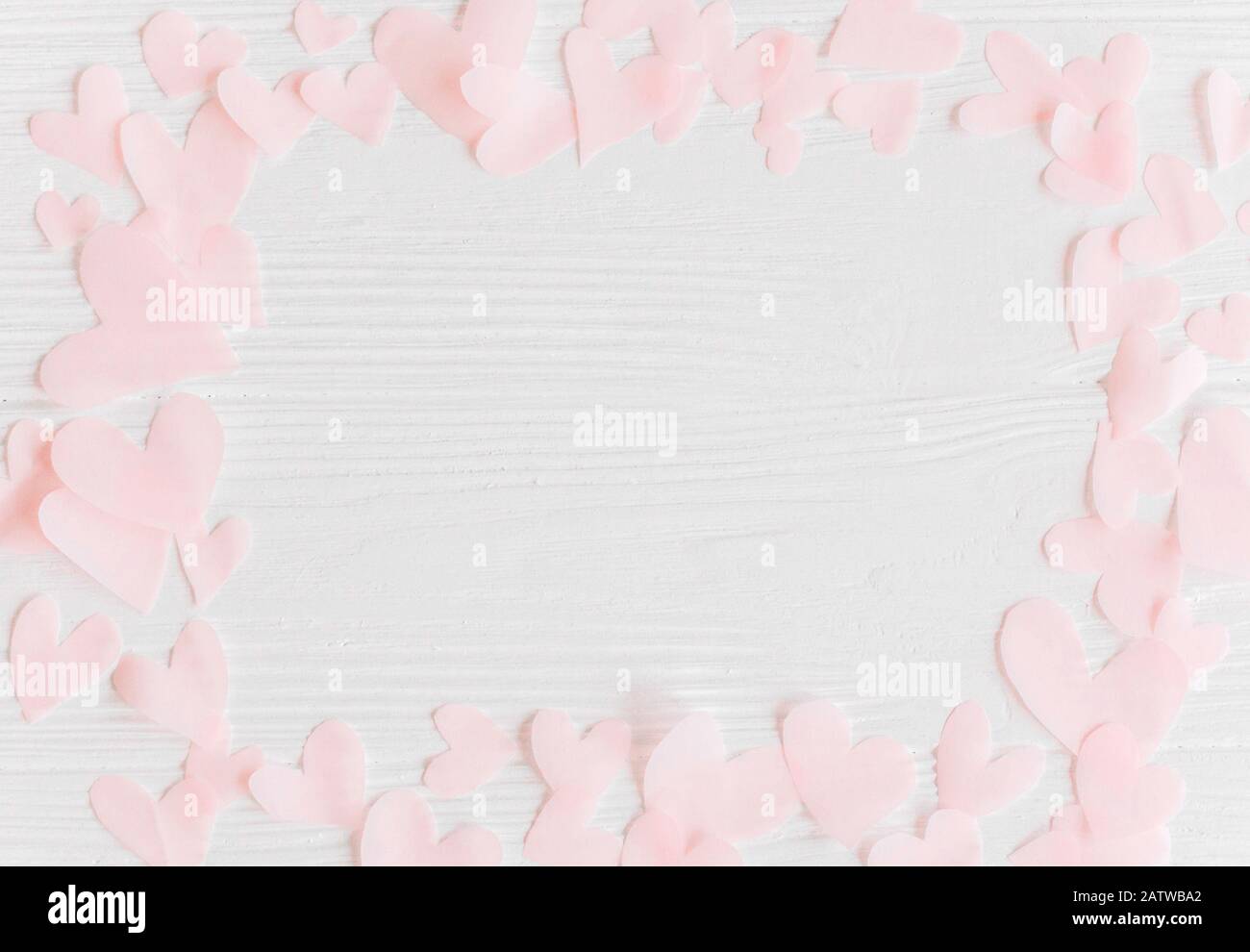 Cute pink hearts on white wooden background with space for text. Flat ...
