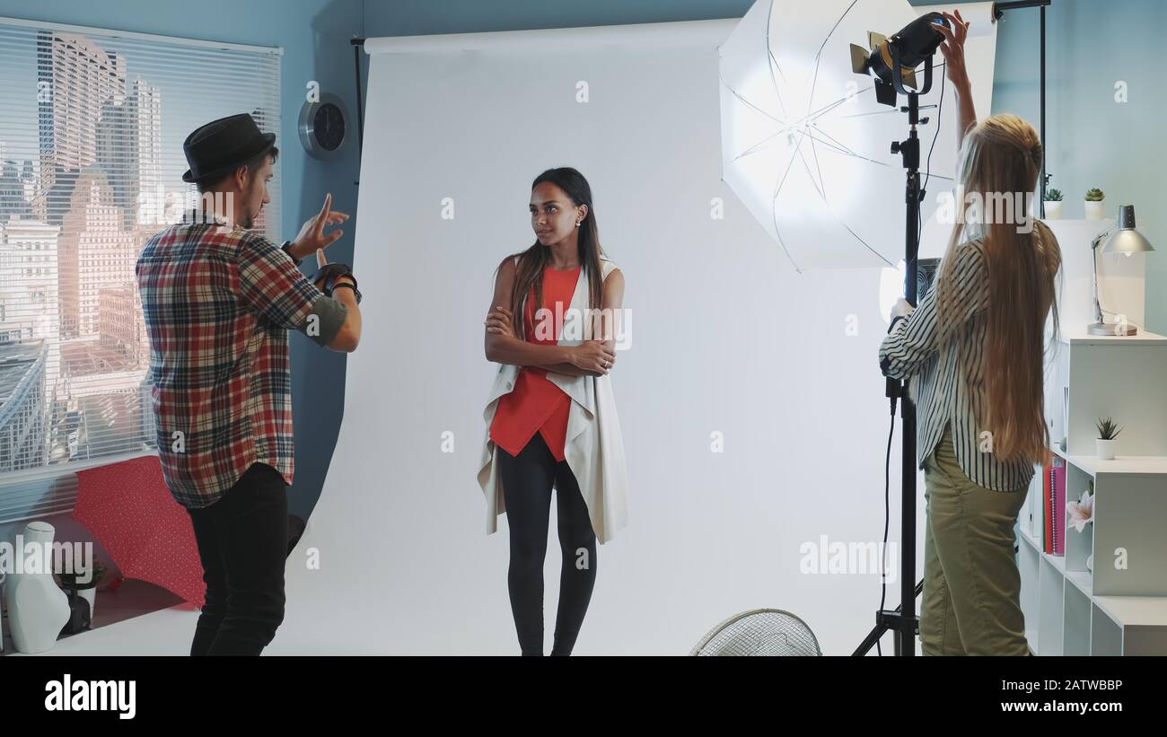 Professional photographer explaining organisational moments of the ...