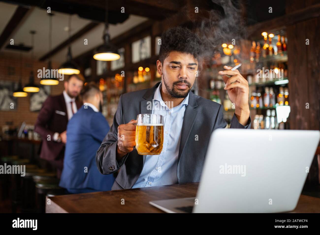 Alcohol addicted young man hi-res stock photography and images - Alamy