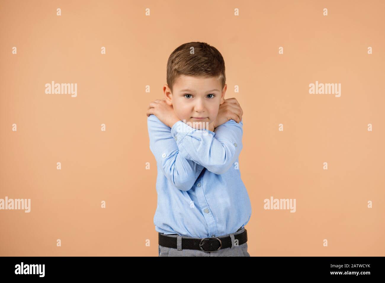 sad scared little child boy in shirt looking at the camera . Human ...