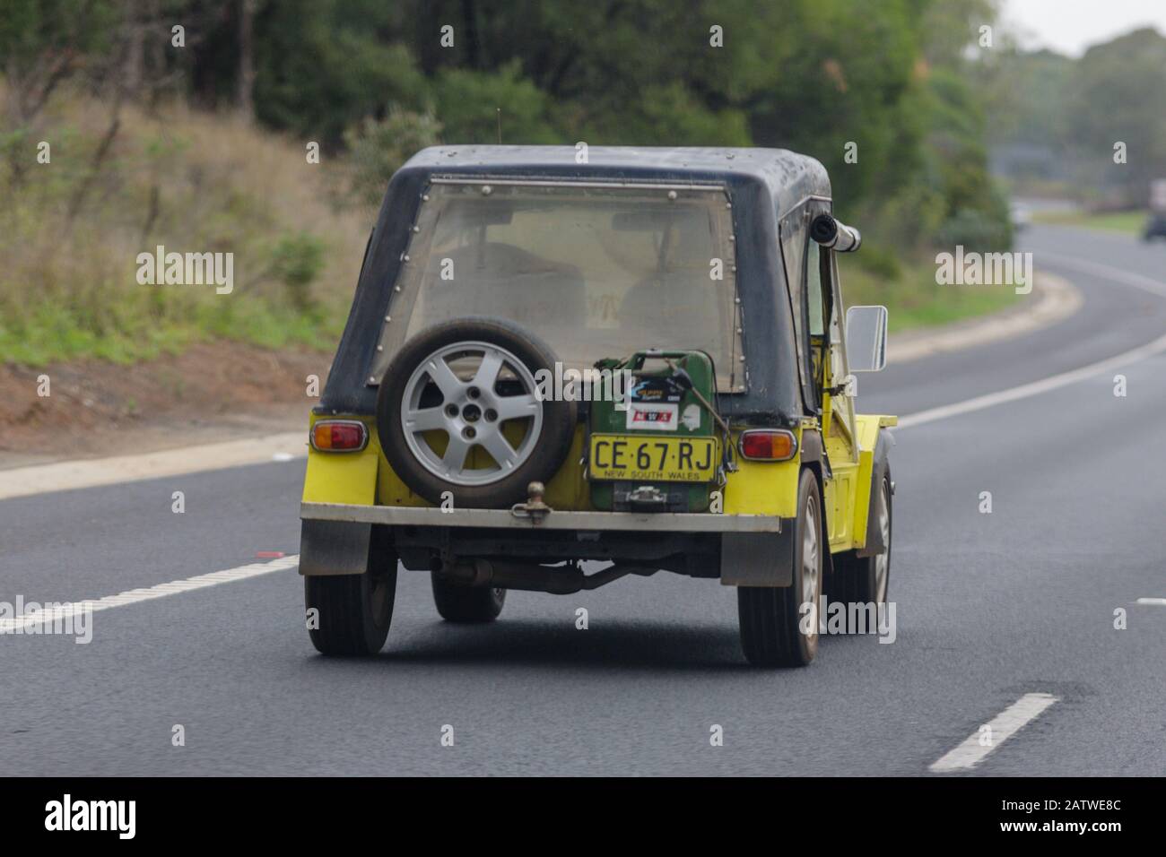 yellow 4wd buggy with soft top travelling on hume highway from sydney ...