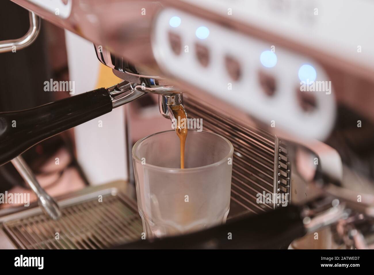 Pour coffee from professional machine hi-res stock photography and ...