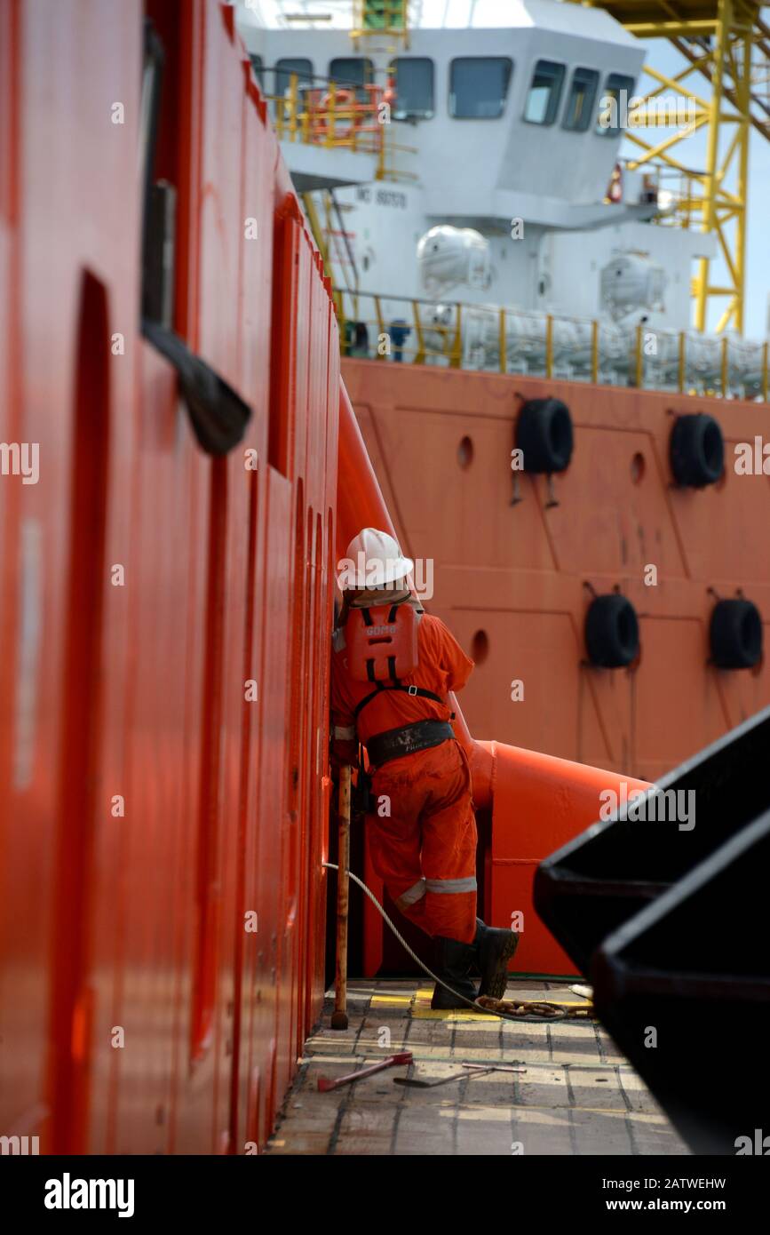 AHTS vessel marine crew carried out anchor handling operation on deck ...