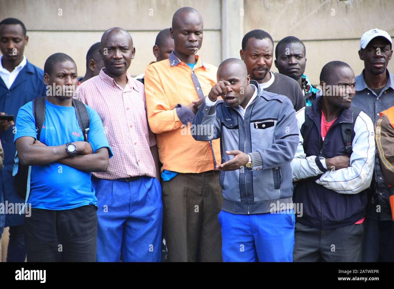 Members of the public mill outside Lee Funeral home where the body of ...