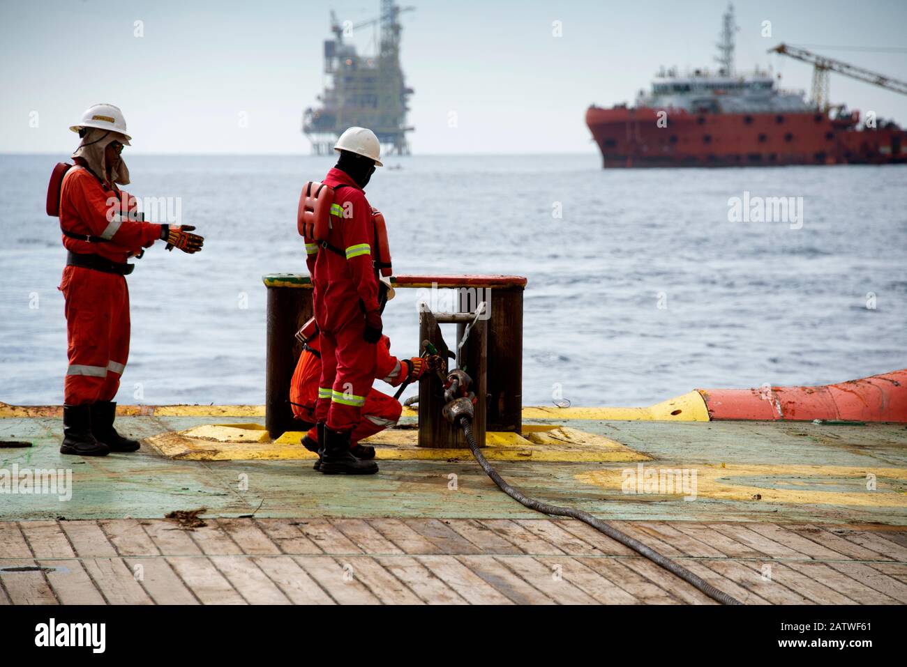 AHTS vessel marine crew carried out anchor handling operation on deck ...