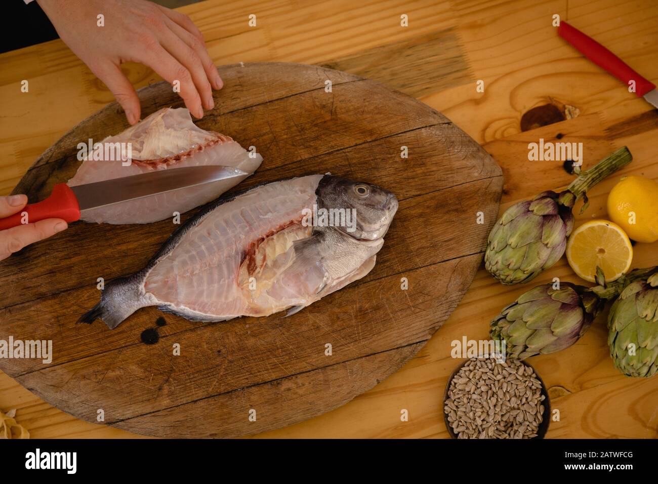 Fish Cutting Station High Resolution Stock Photography and Images - Alamy