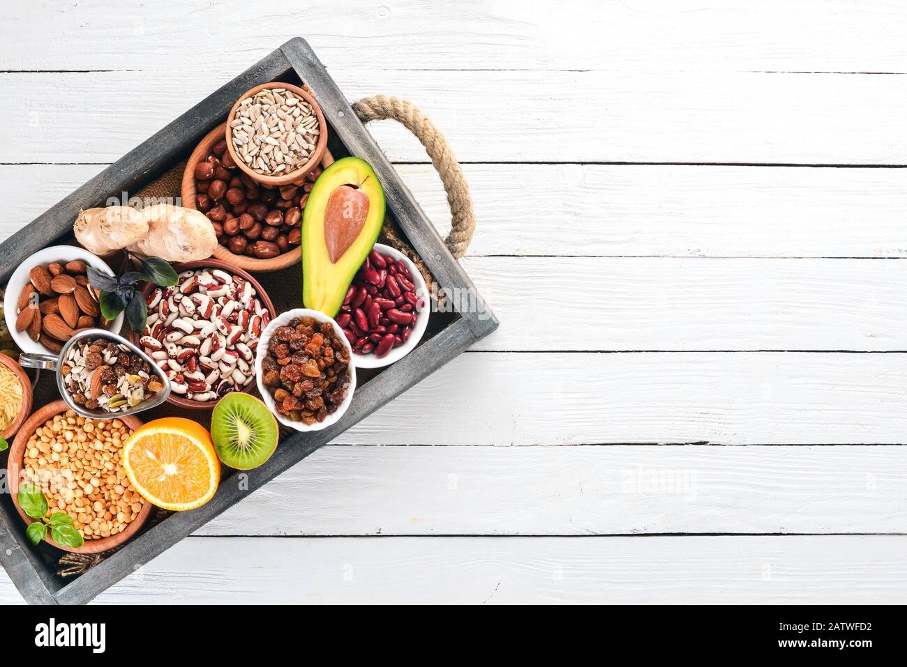 Various superfoods. In a wooden box. Top view. Free copy space Stock ...