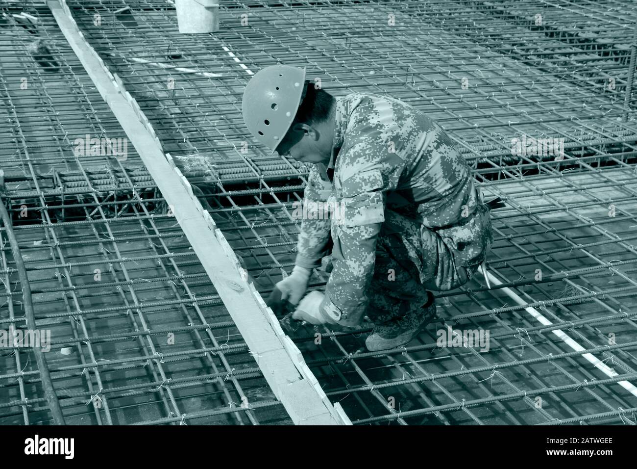The construction site, the worker is working Stock Photo - Alamy