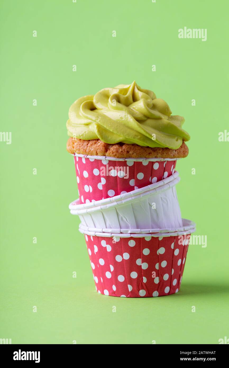 Birthday cupcake in funny polka dot red and white colorful cups stack ...