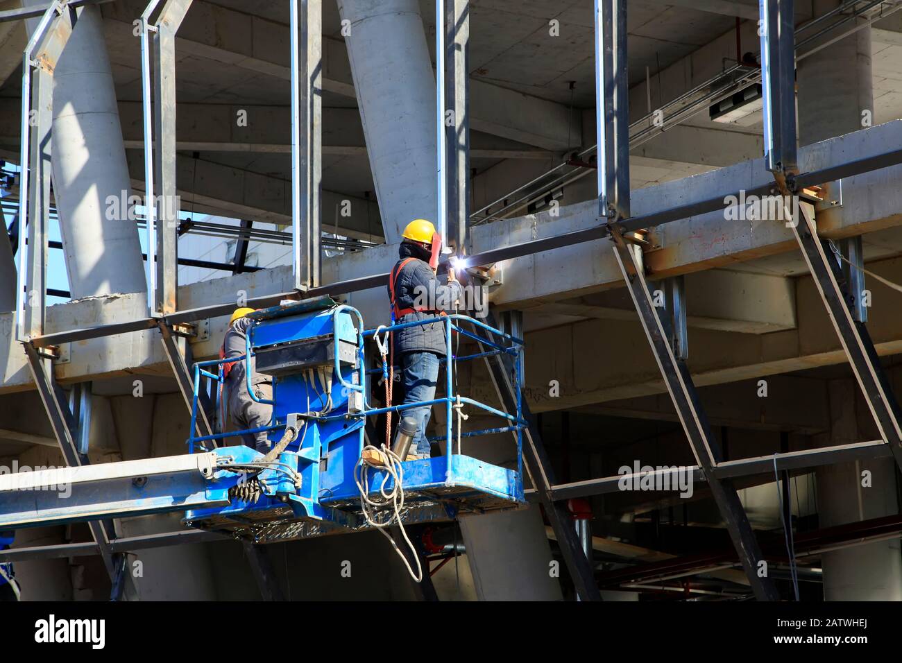Construction site, the welding workers at work Stock Photo - Alamy