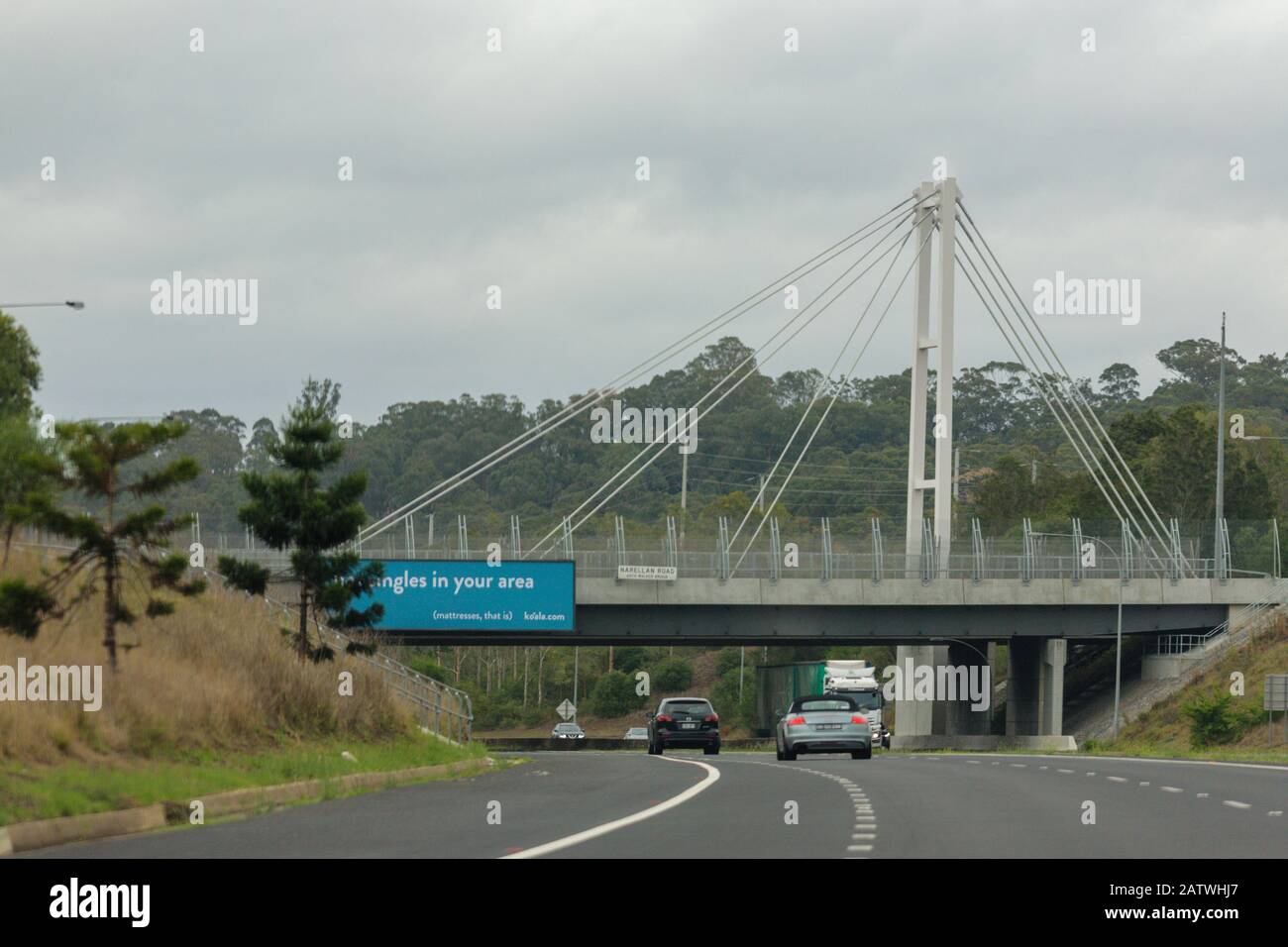 Cars going under bridge hi-res stock photography and images - Alamy