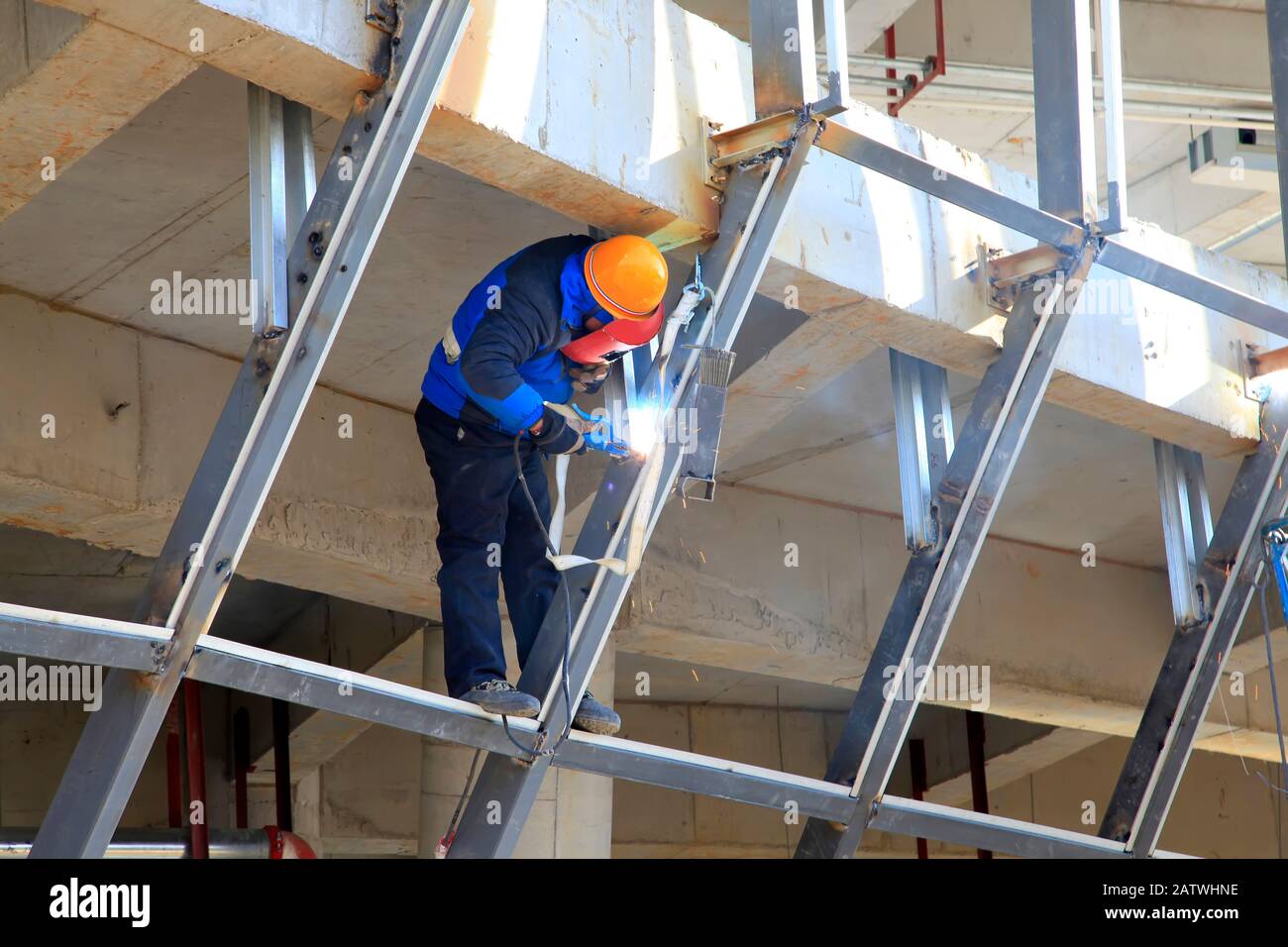 Construction site, the welding workers at work Stock Photo - Alamy