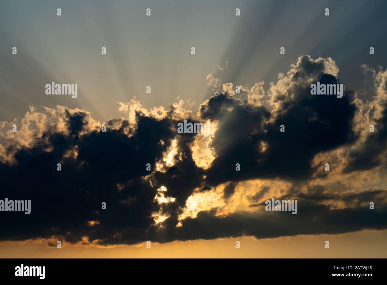 Dramatic sky with sunrays. World environment day concept Stock Photo ...