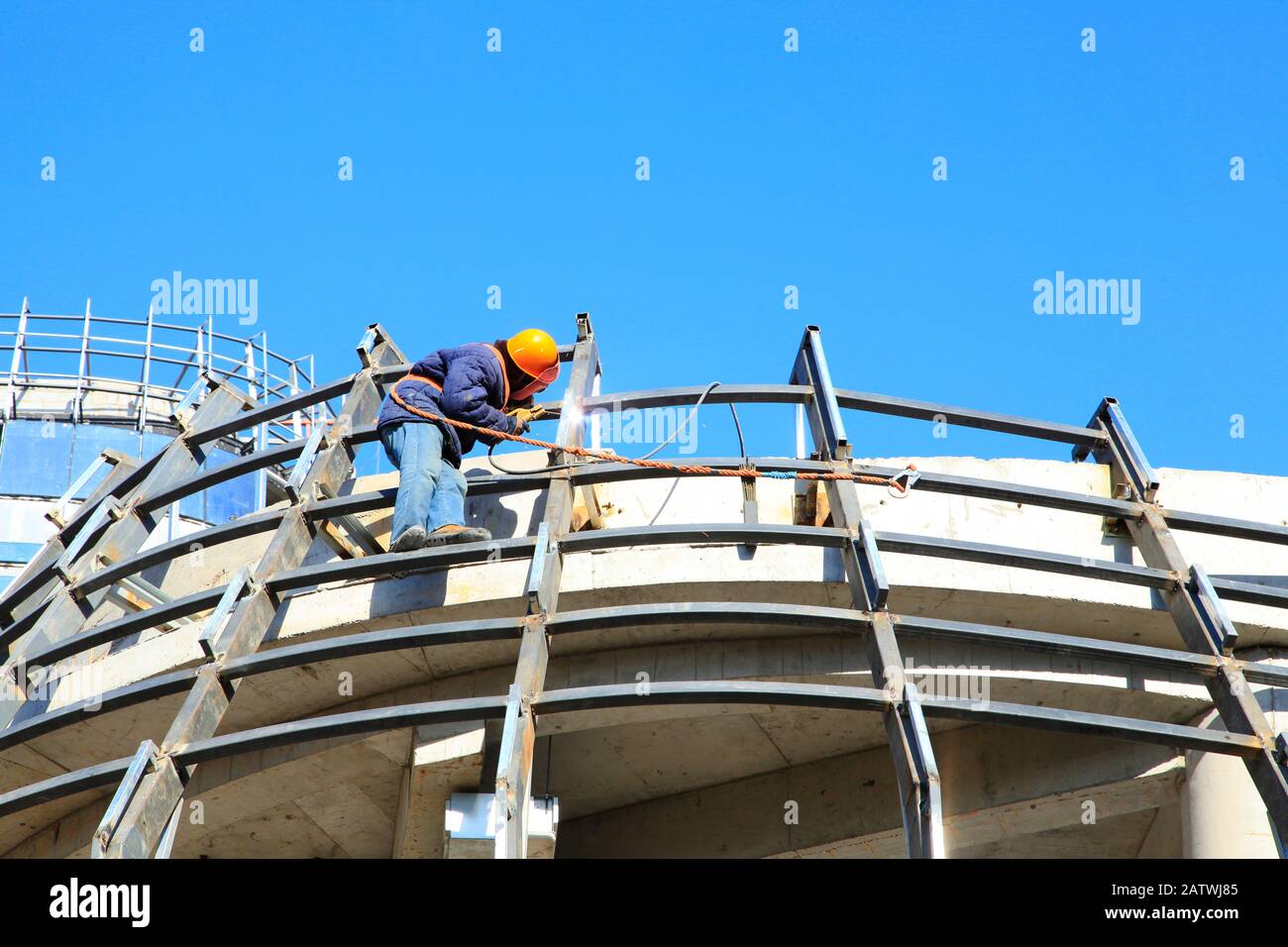 Construction site, the welding workers at work Stock Photo - Alamy