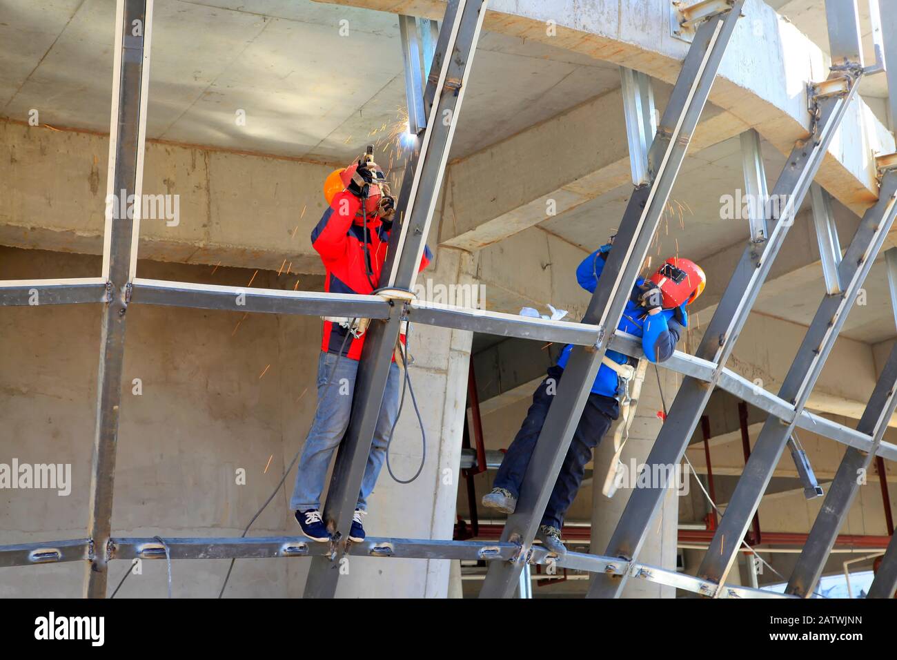 Construction site, the welding workers at work Stock Photo - Alamy
