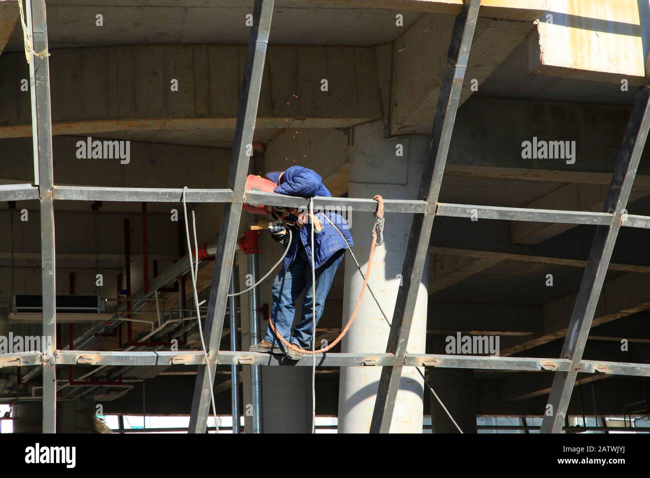 Construction site, the welding workers at work Stock Photo - Alamy