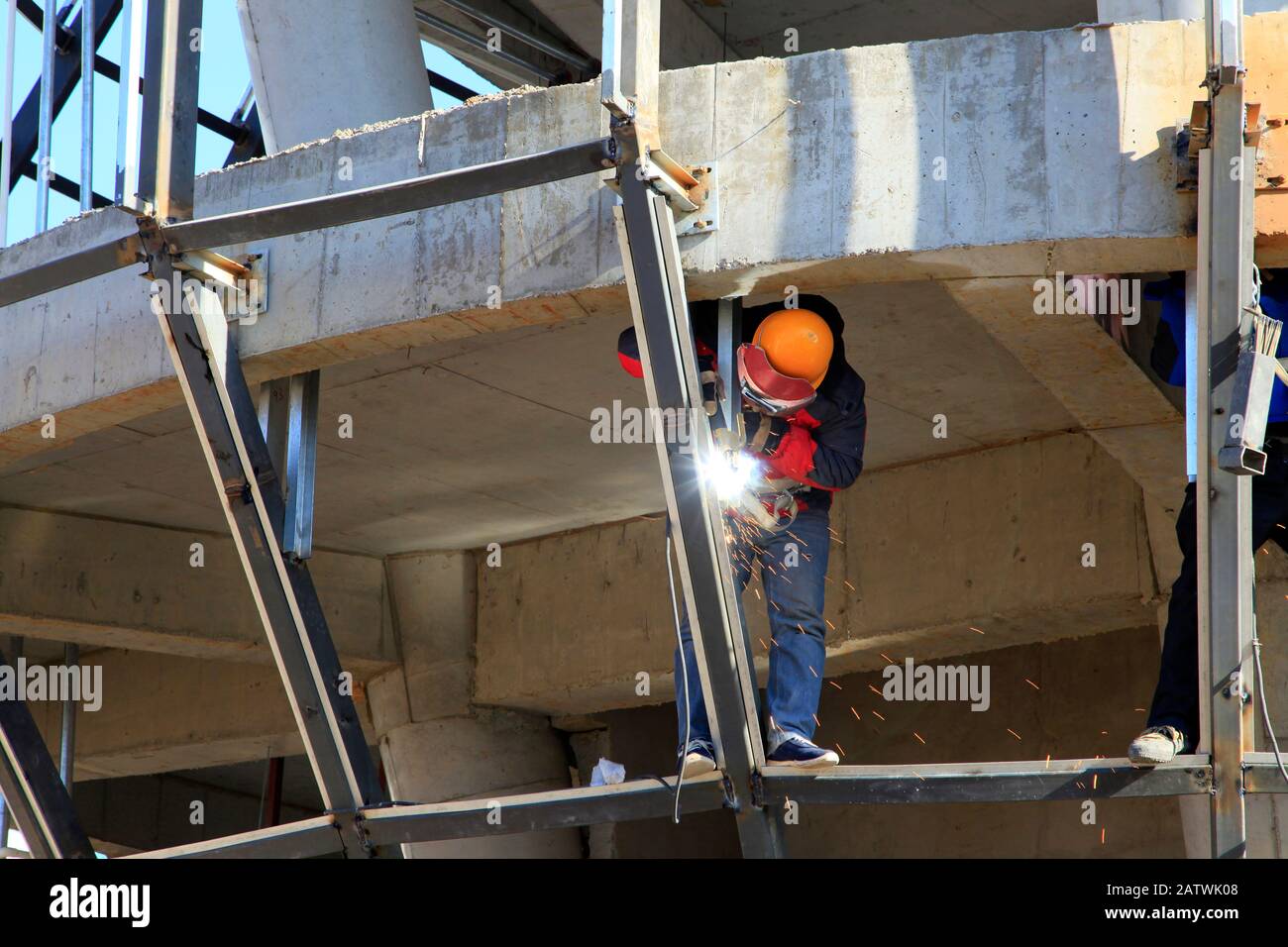 Construction site, the welding workers at work Stock Photo - Alamy