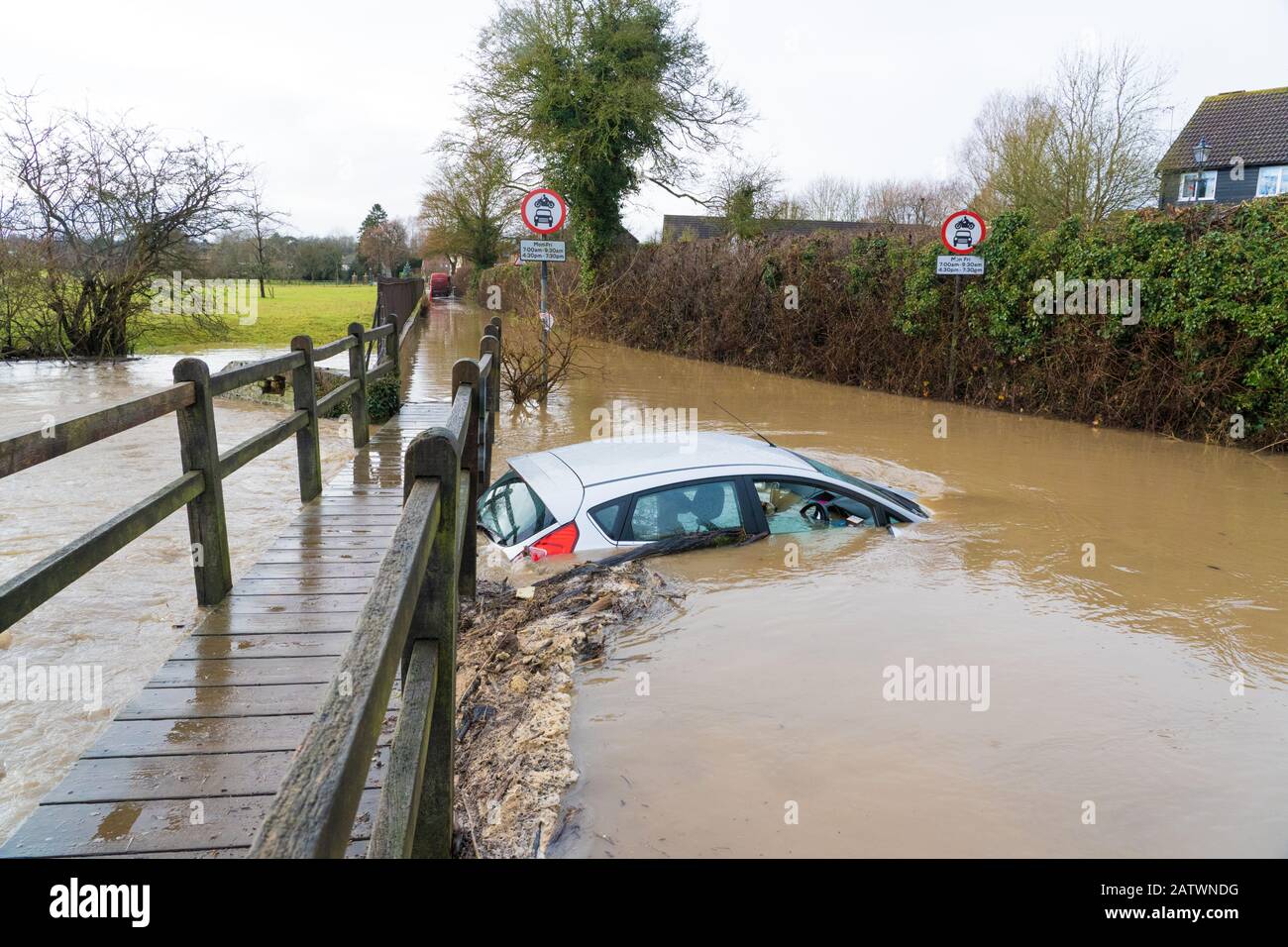 Car submerged in a flooded ford in Much Hadham, Hertfordshire UK Stock ...