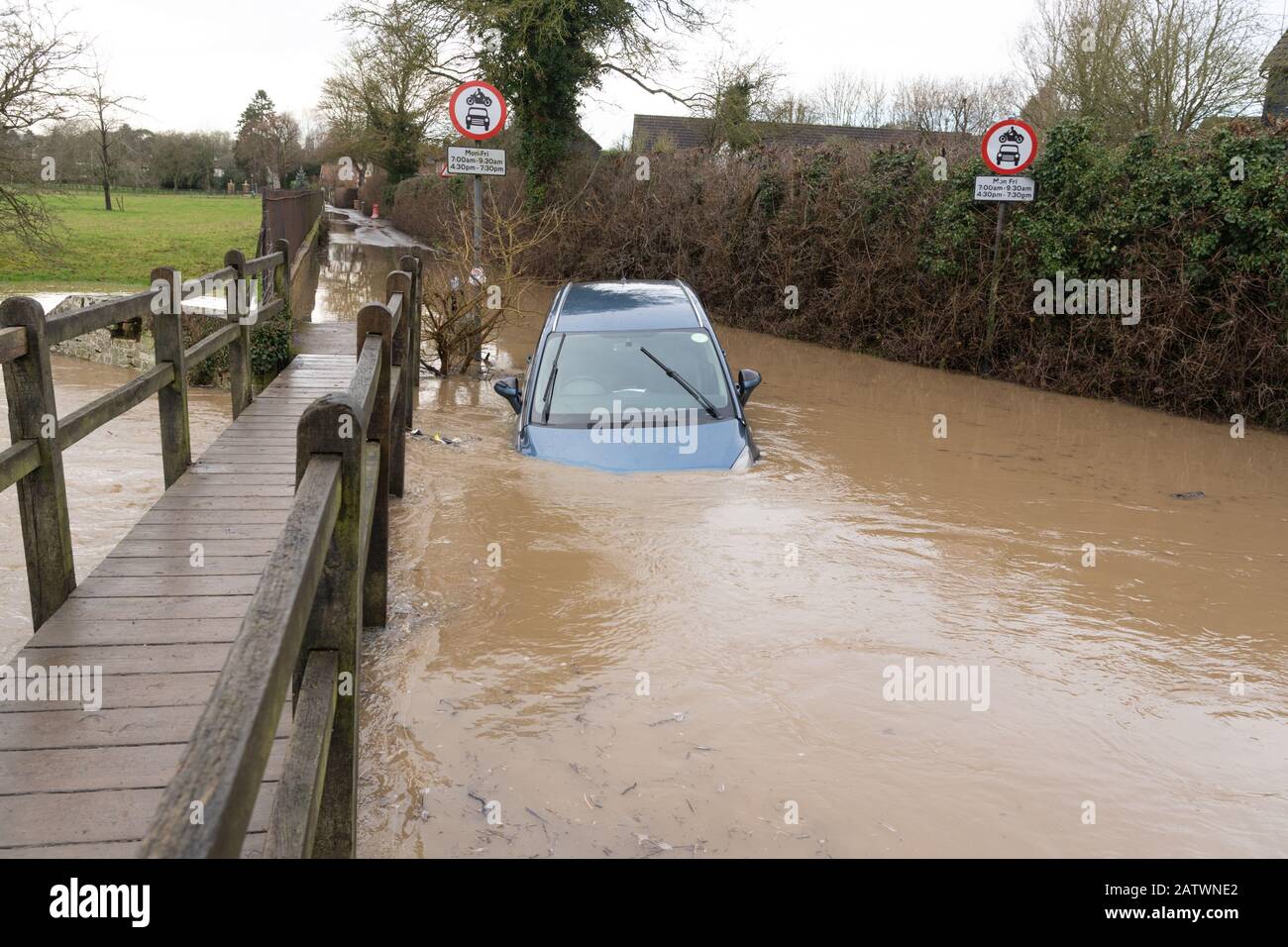 Car submerged in a flooded ford in Much Hadham, Hertfordshire UK Stock ...