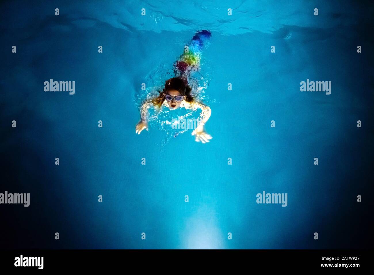 Woman swimming towards light hi-res stock photography and images - Alamy