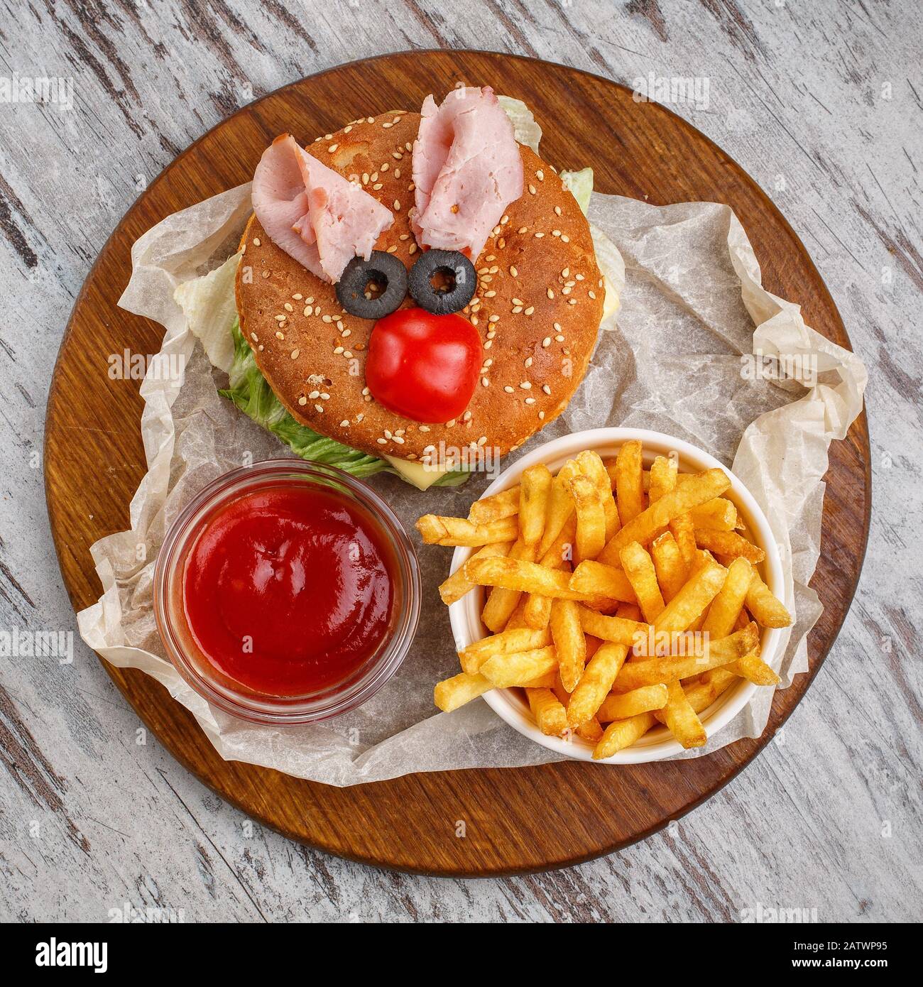 Funny burger-smile with French fries and ketchup Stock Photo - Alamy