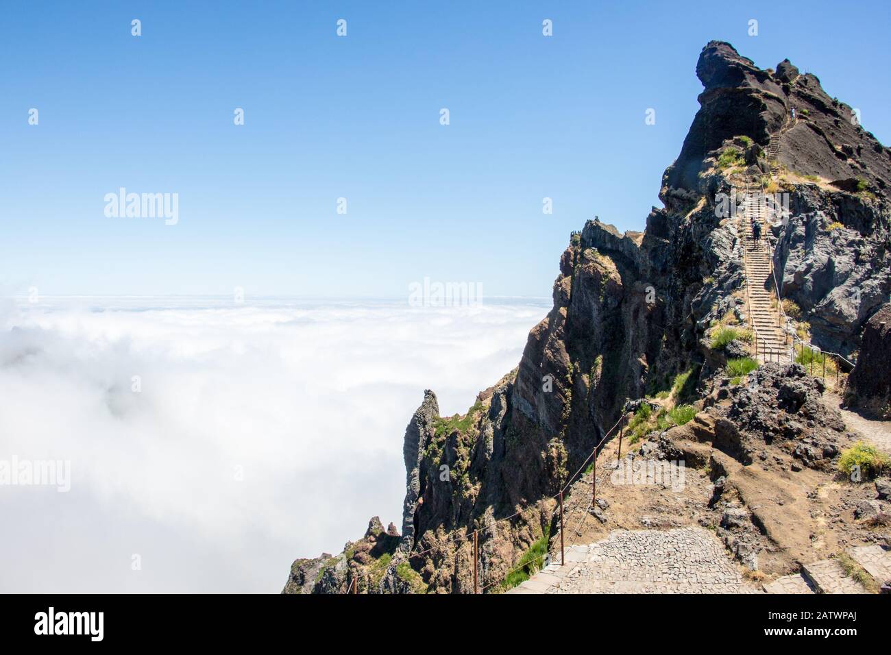 Madeira mountains high over the sky hiking path with sea of clouds ...