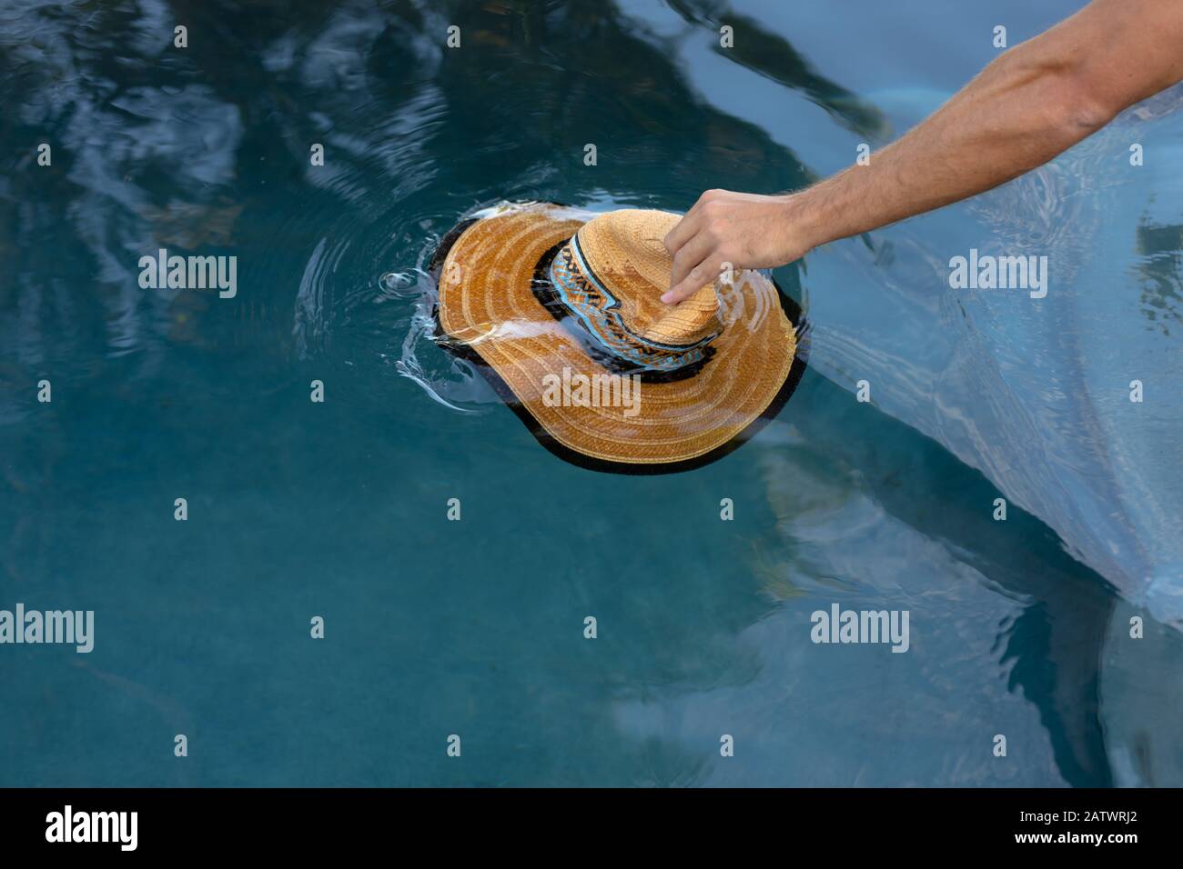 View of a hat in a swimming pool Stock Photo - Alamy