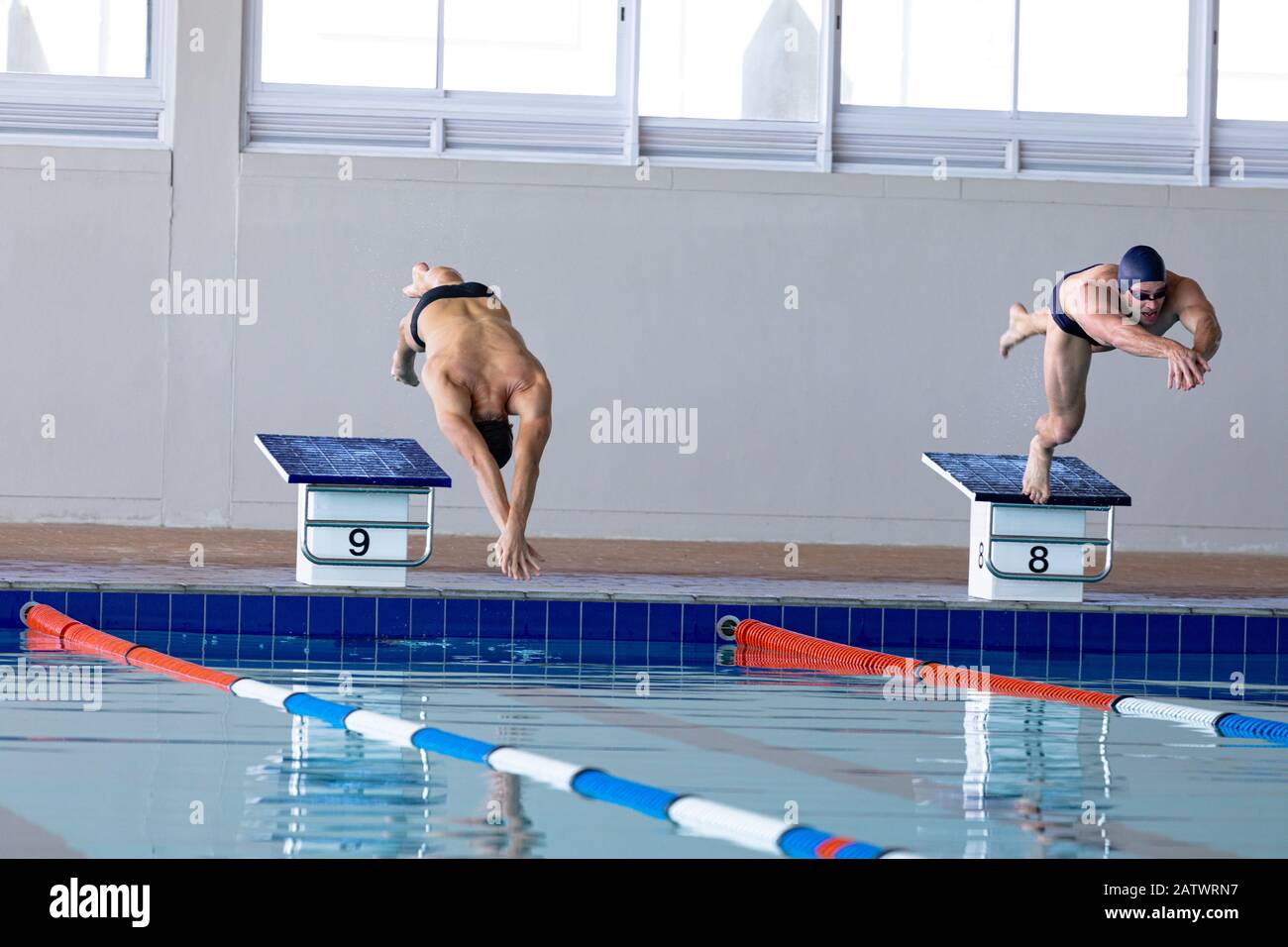 Swimmers jump water in swimming hi-res stock photography and images - Alamy