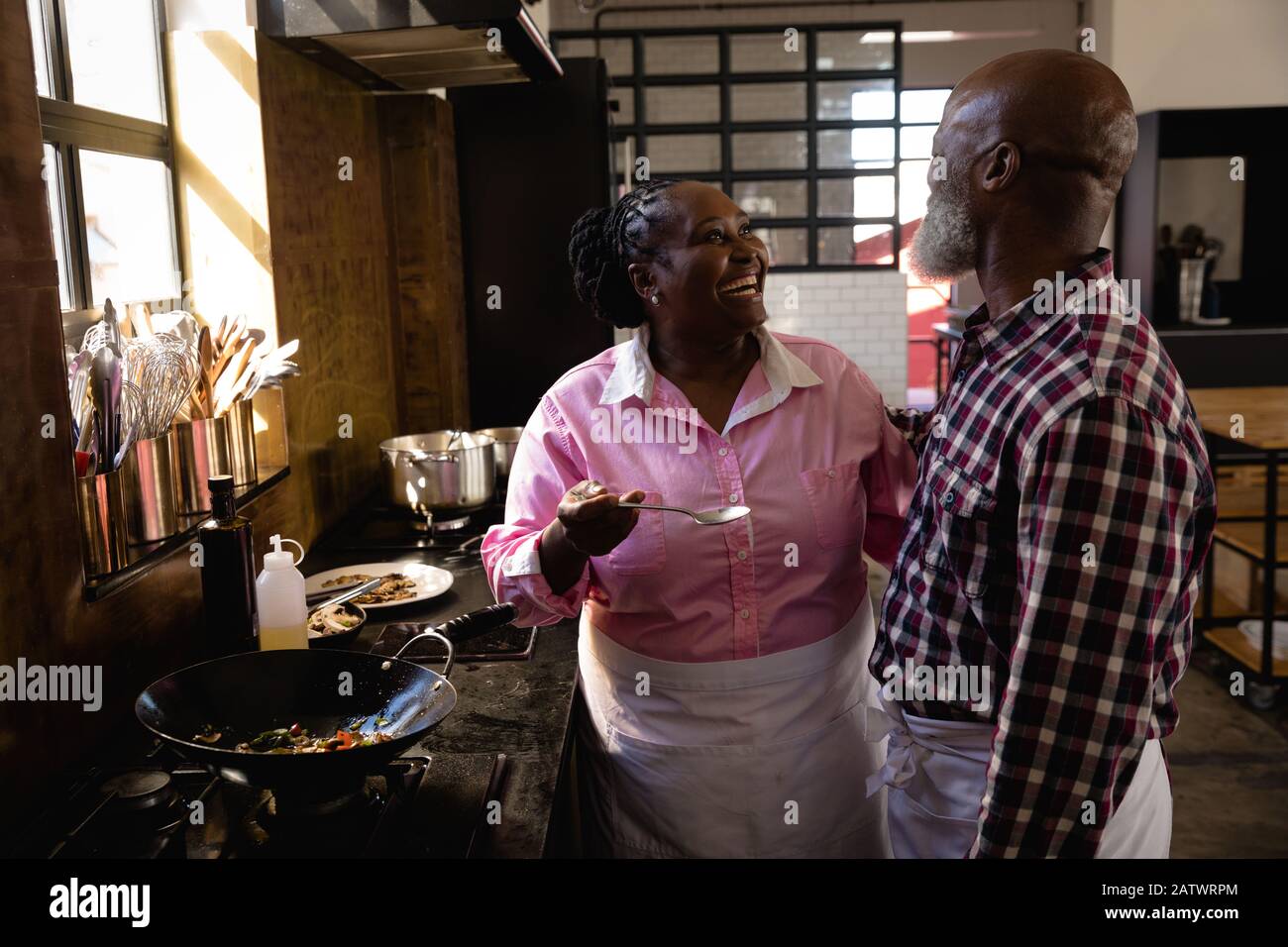 African chefs having fun while cooking Stock Photo - Alamy
