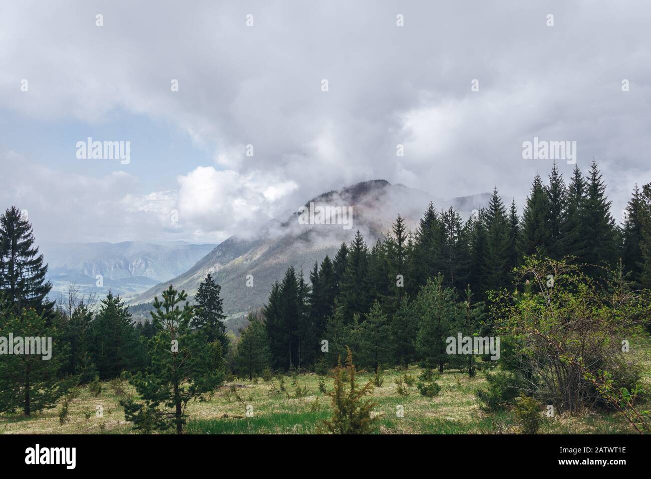 Clouds over mountain Stock Photo - Alamy
