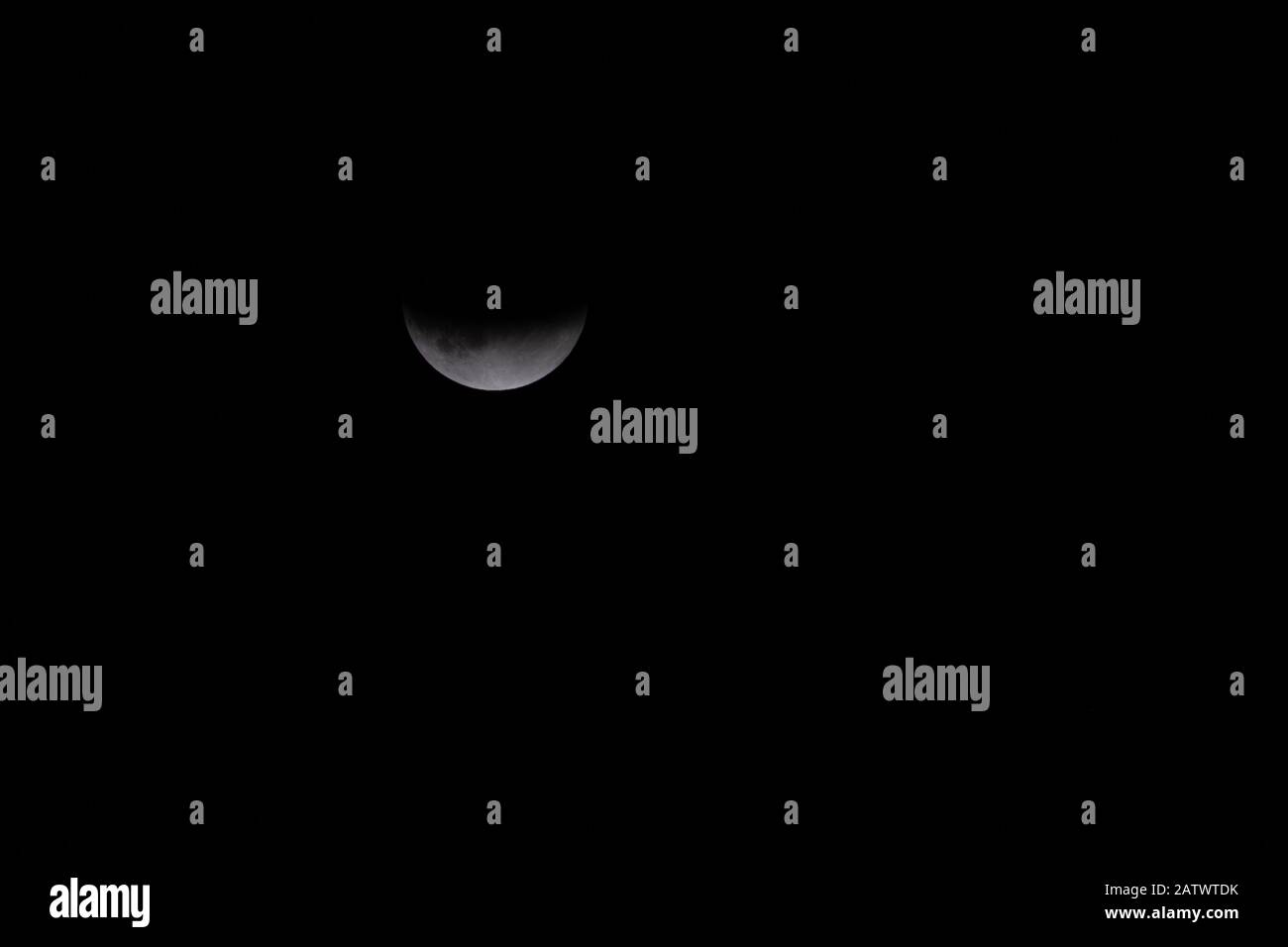 July 16, 2019, Partial moon eclipse Stock Photo - Alamy