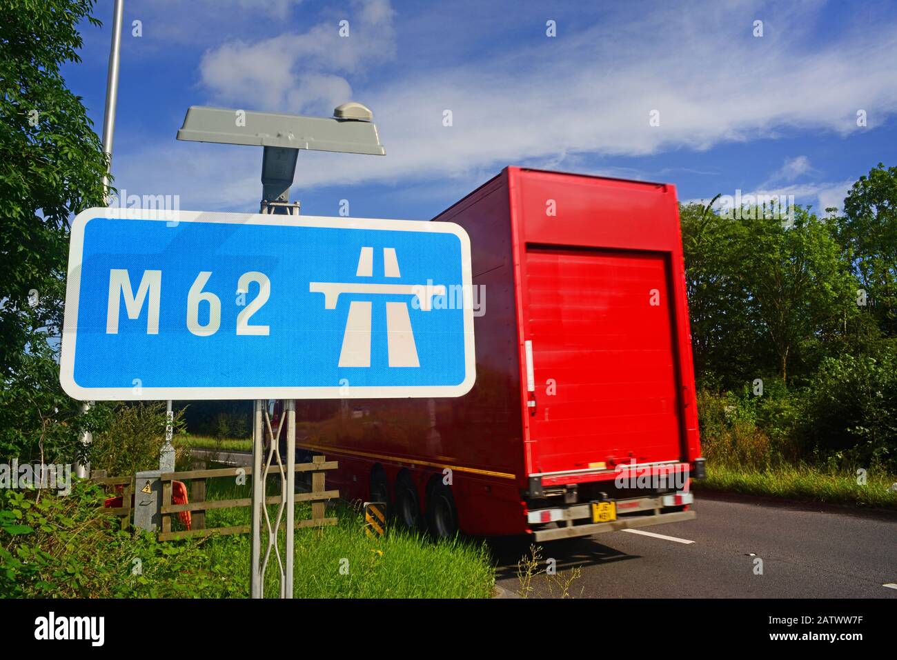 traffic passing m62 motorway sign at normanton junction leeds yorkshire ...