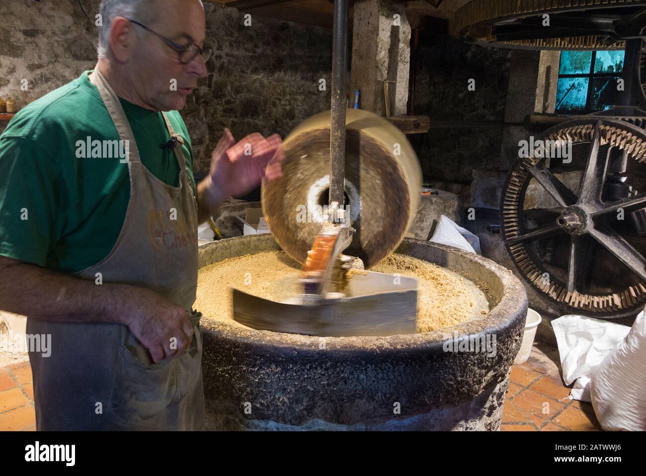 Proprietor of Le Moulin de Chanaz milling grinding either walnuts or ...