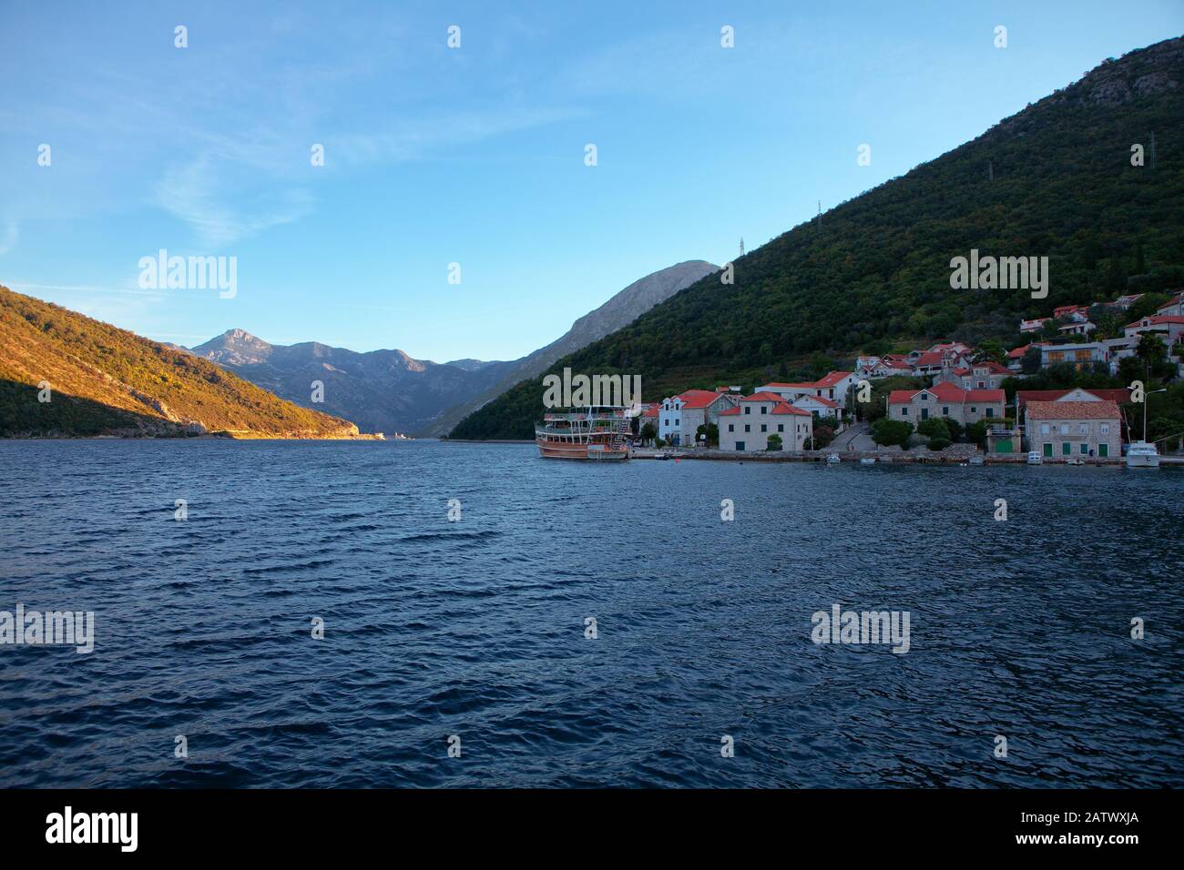 travel by boat on the bay between mountains Stock Photo - Alamy