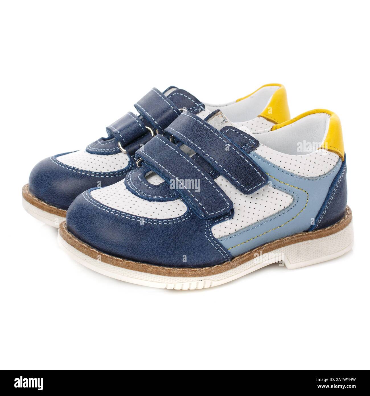 Children's blue and white shoes for boys isolated on white. Side view ...