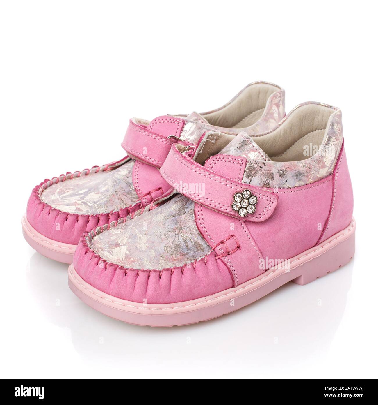 Children's pink shoes for little girls isolated on white. Side view ...