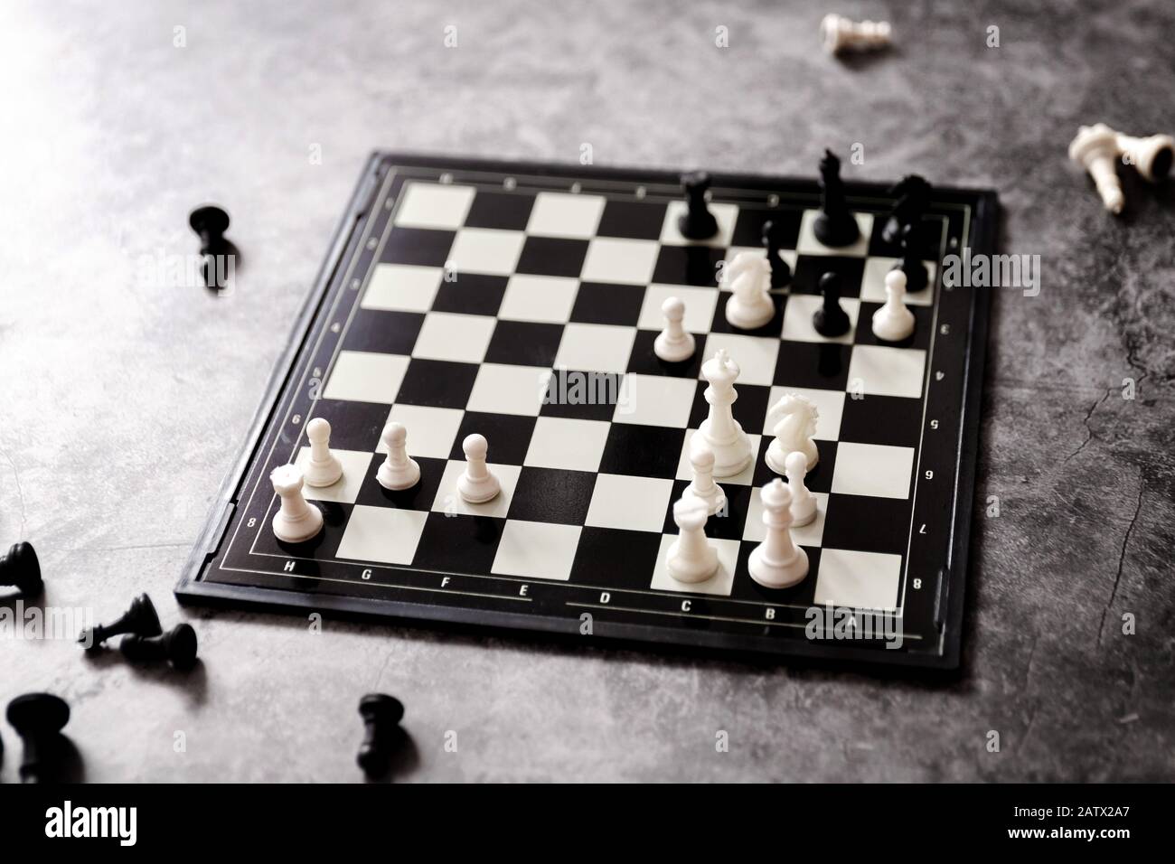 chess figures, a chess game on a modern plastic chessboard Stock Photo ...