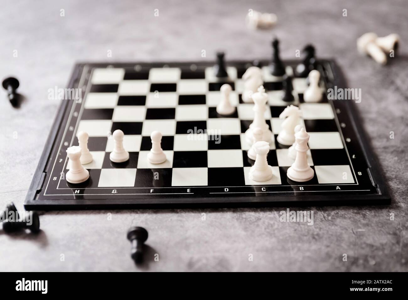 chess figures, a chess game on a modern plastic chessboard Stock Photo ...